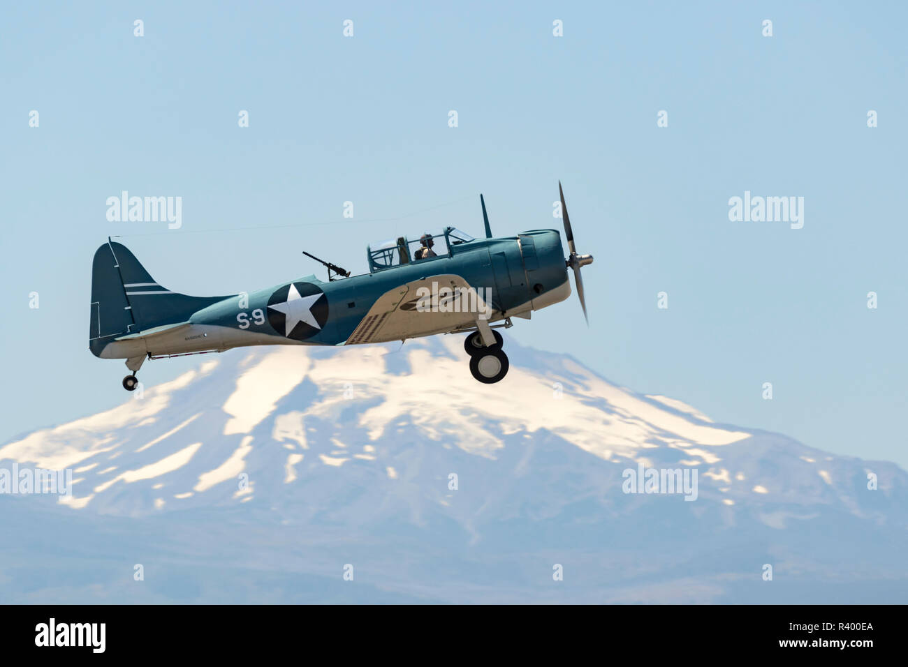 Douglas SBD dive bomber with Mt. Jefferson in the background, Madras ...