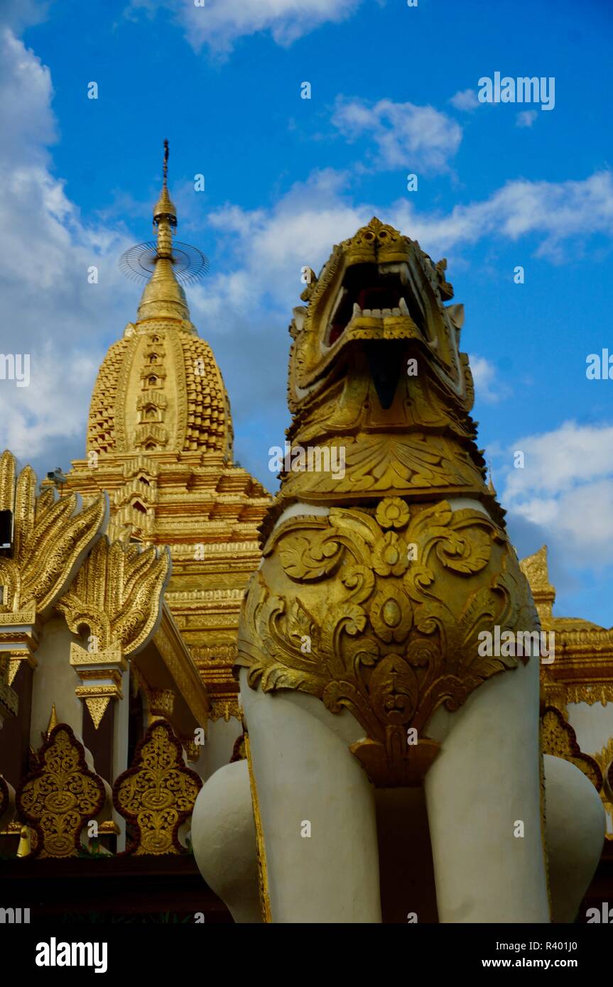 Lion and pagoda, Myanmar Stock Photo - Alamy
