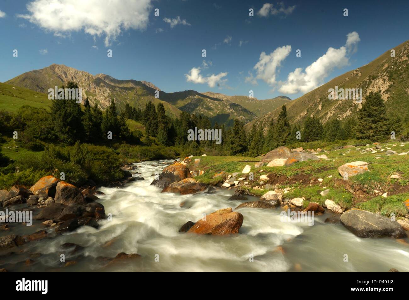 A fast flowing river in the Tian Shan mountains in Kyrgyzstan Stock ...