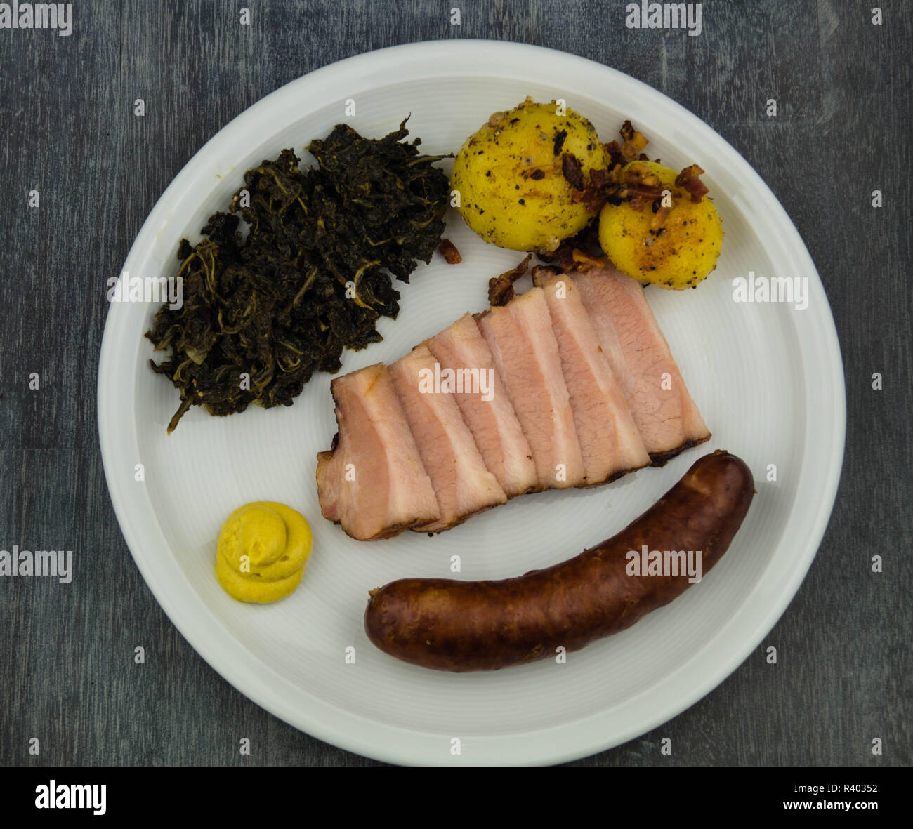 traditional northern german Food curly Kale with pork Bacon and ...