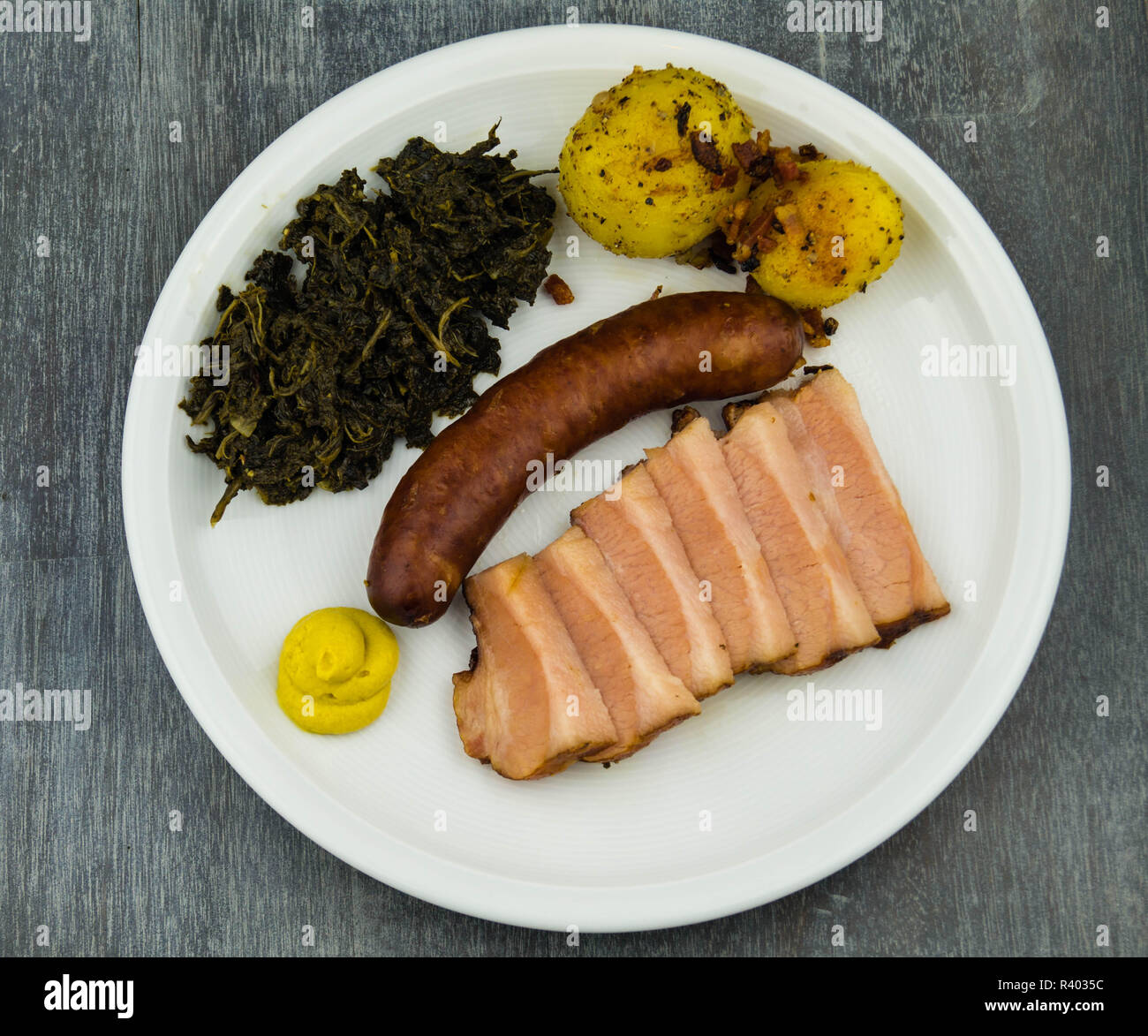 traditional northern german Food curly Kale with pork Bacon and ...