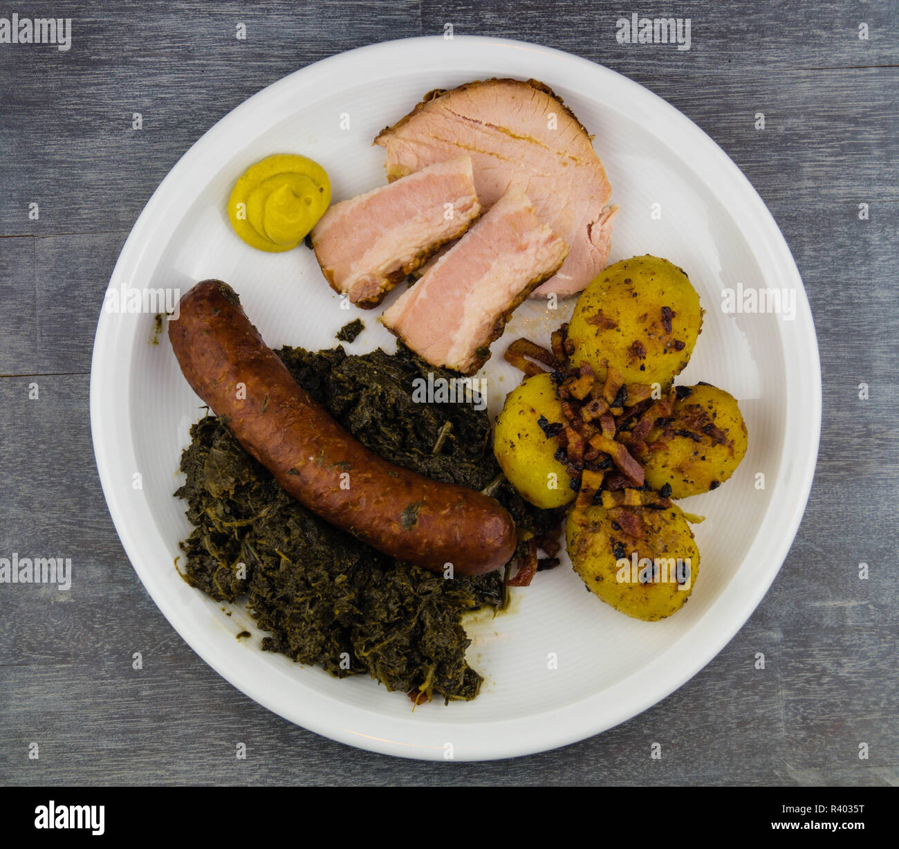 traditional northern german Food curly Kale with pork Bacon and ...