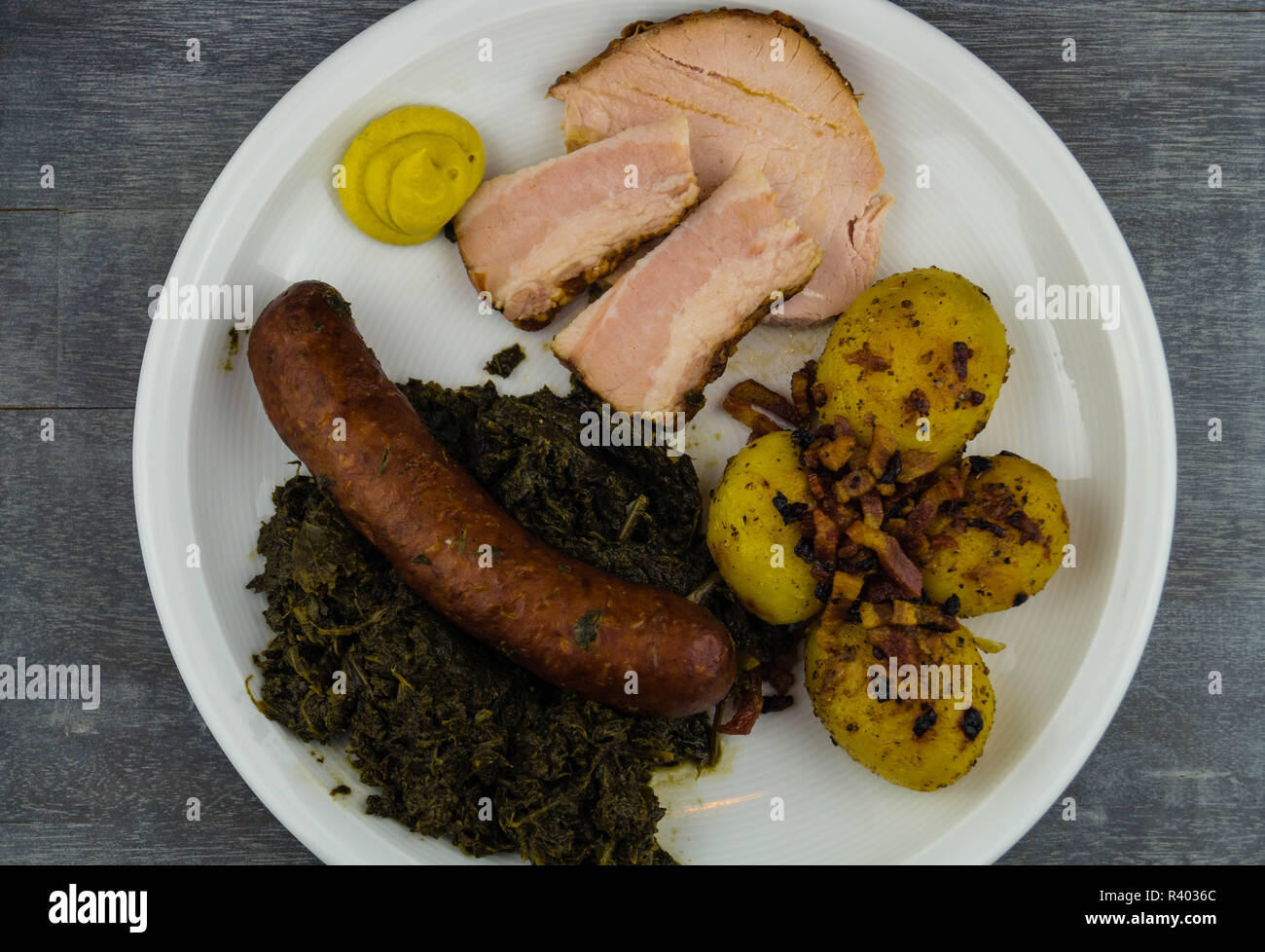 traditional northern german Food curly Kale with pork Bacon and ...