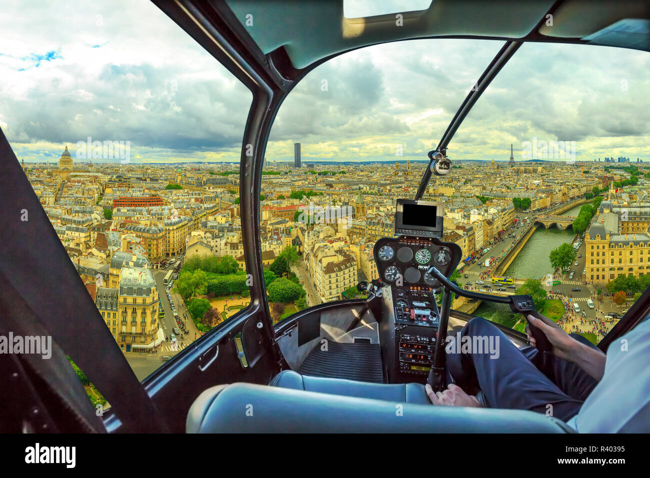 Helicopter cockpit flying on Notre Dame skyline of Paris, French ...