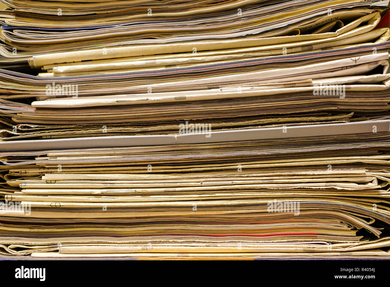 Pile of old newspapers and magazines, stack, side view Stock Photo - Alamy