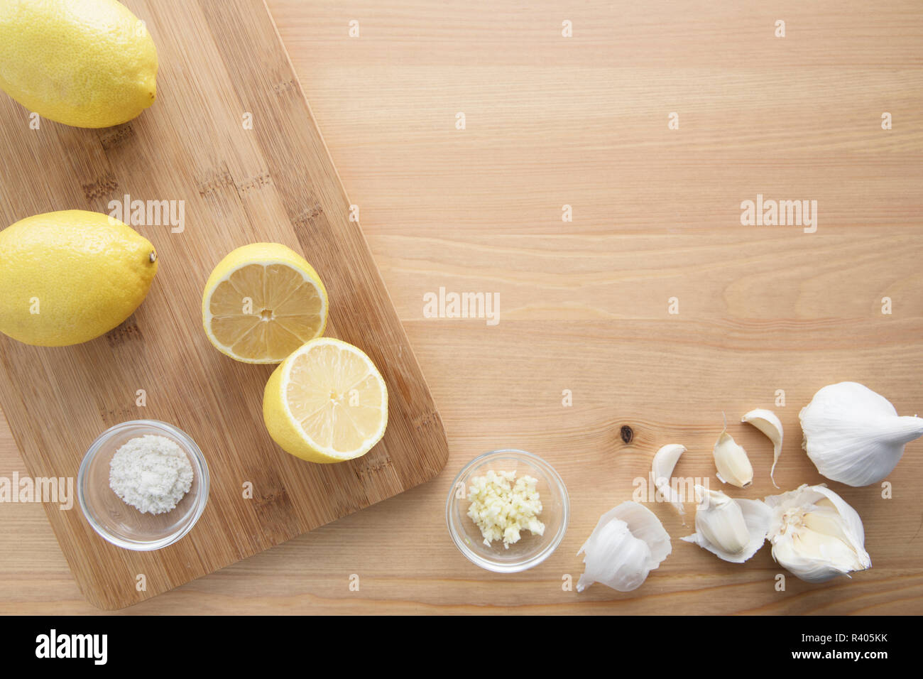 Cooking with lemon and garlic, flat lay with copy space Stock Photo - Alamy