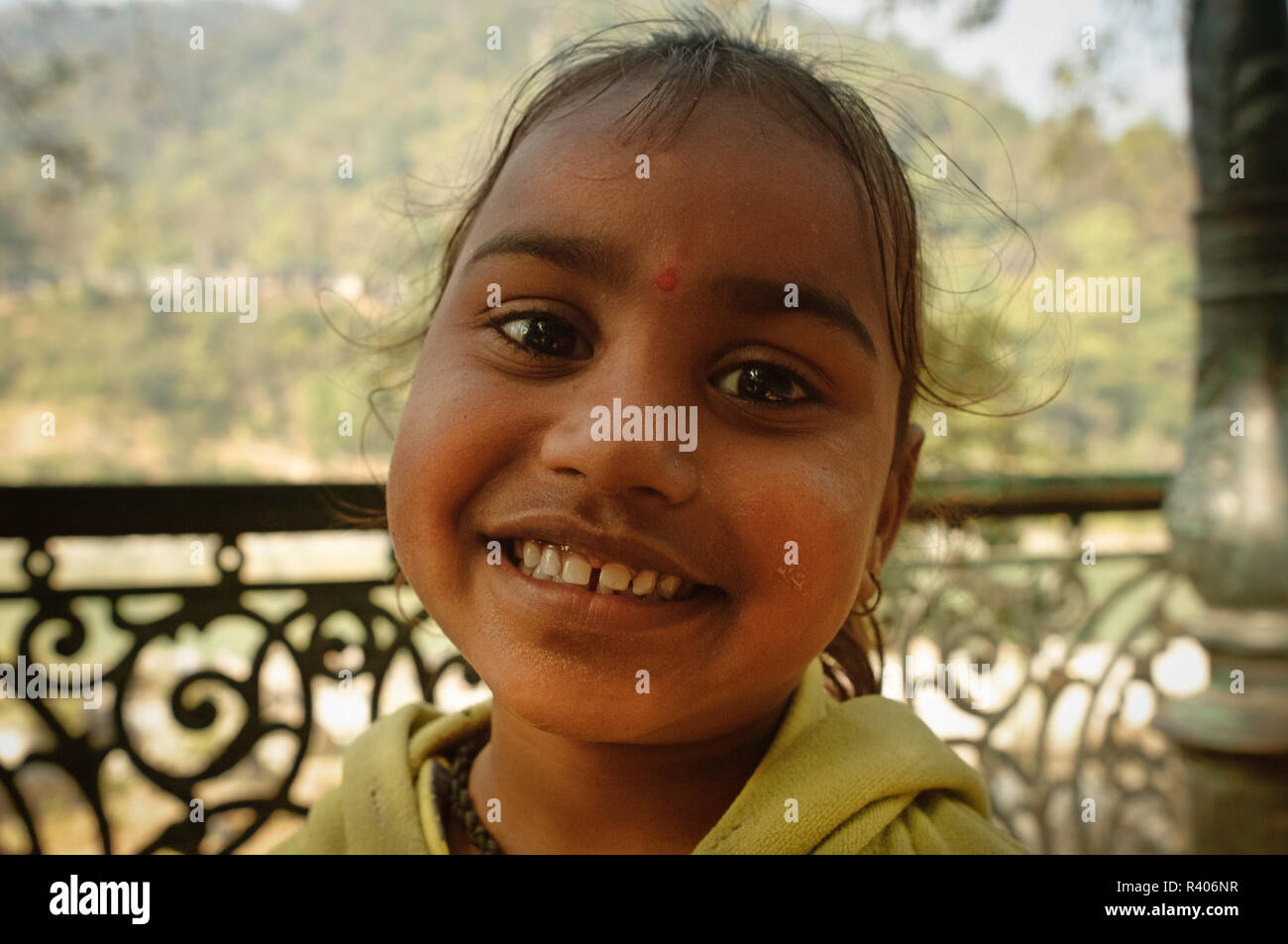 Smiling girl at the Holy Ganges river. Rishikesh, India Stock Photo - Alamy