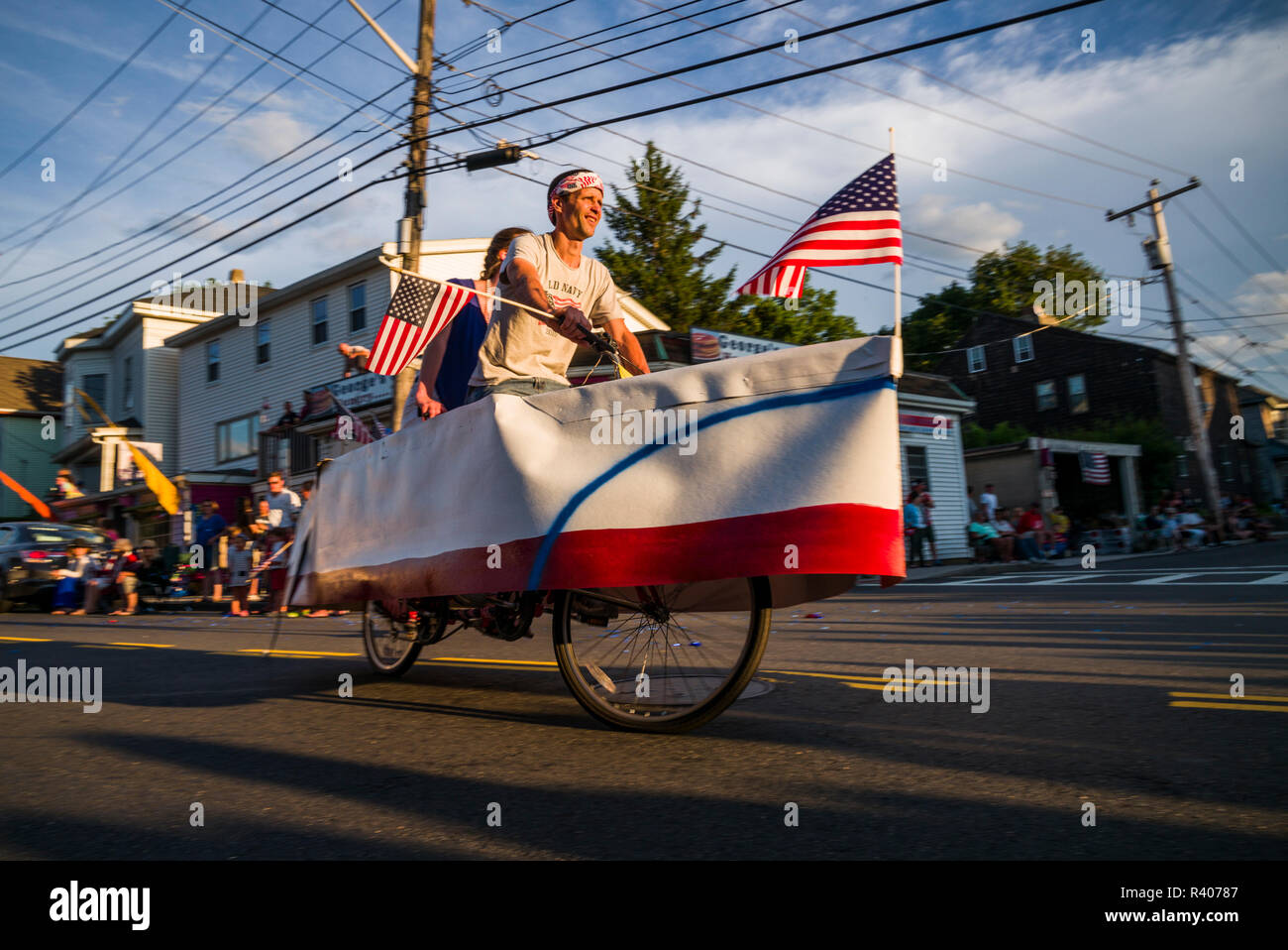 USA, Massachusetts, Cape Ann, Gloucester, Fourth of July parade, boat-shaped bicycle Stock Photo ...