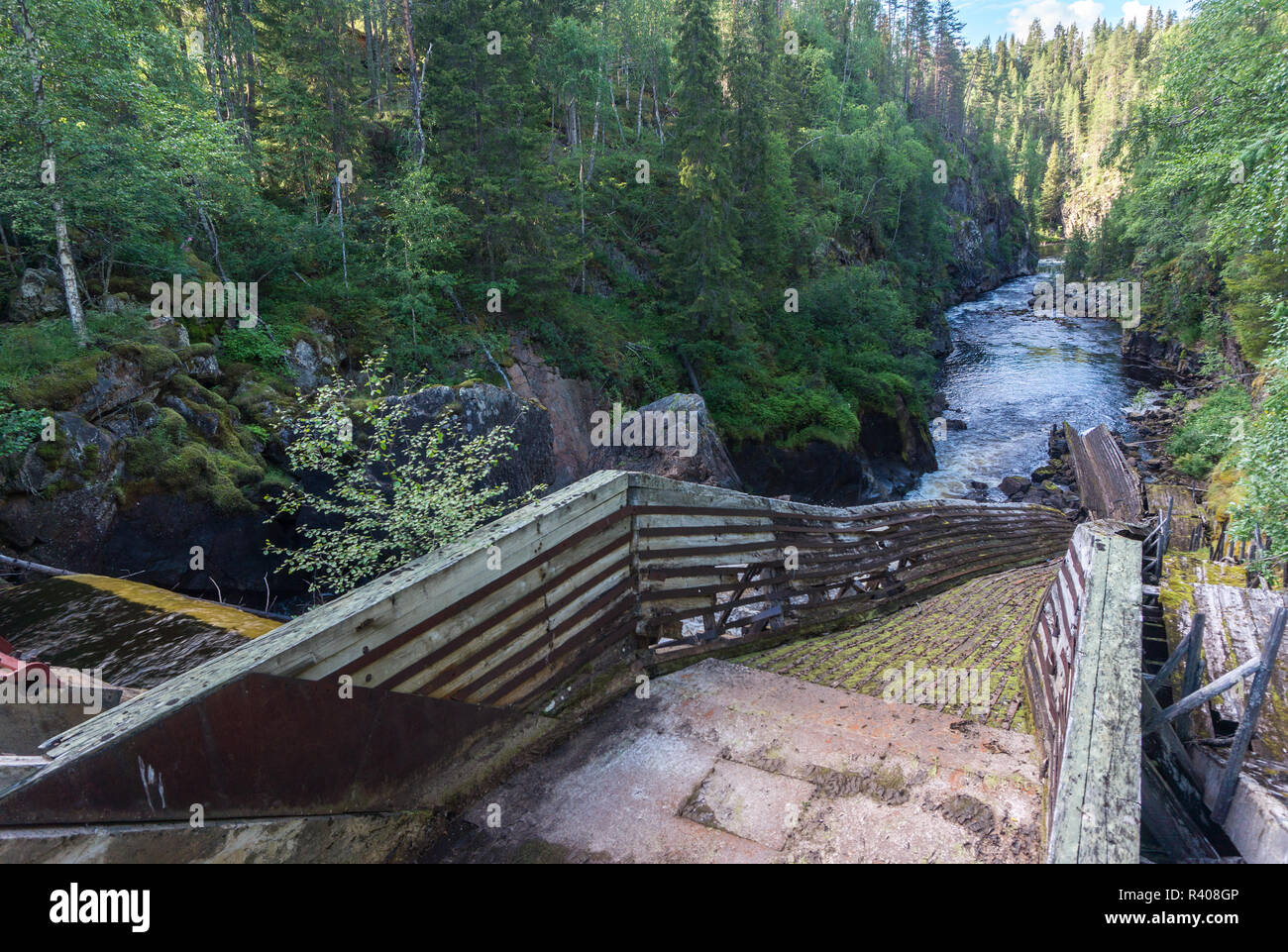 Old chute for transporting timber over the dam along the river ...