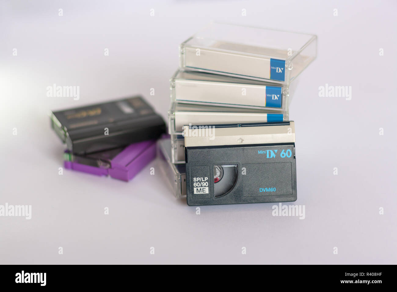 Mini dv and VHS video tape isolated on white. Casettes Stock Photo - Alamy