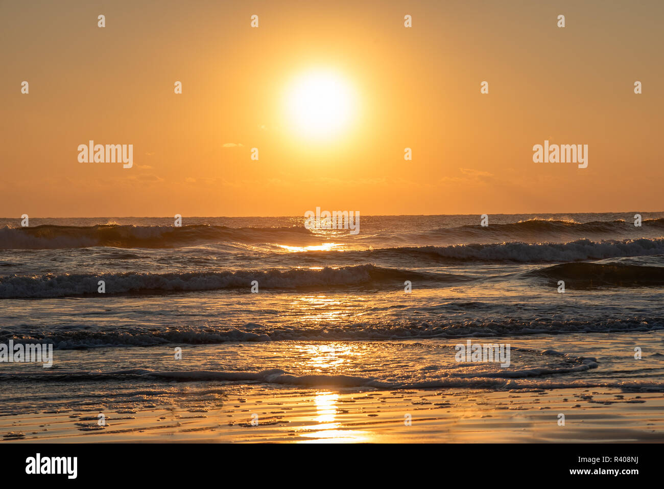 Beach shot with waves during sunrise in Saint Augustine Beach Stock ...