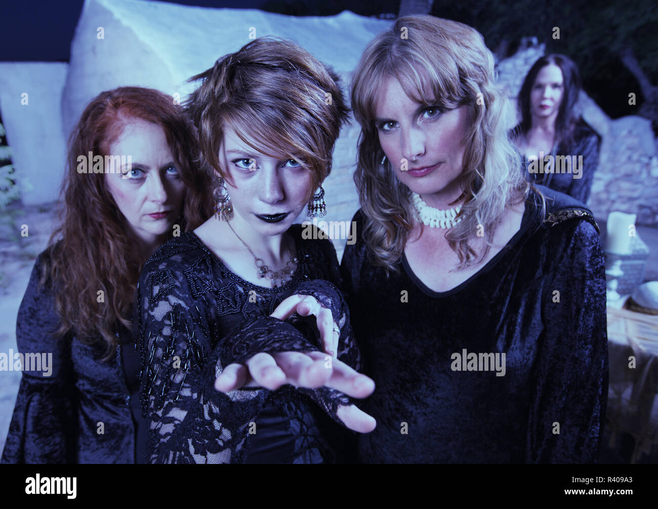 Three of Witches Outdoors Stock Photo - Alamy