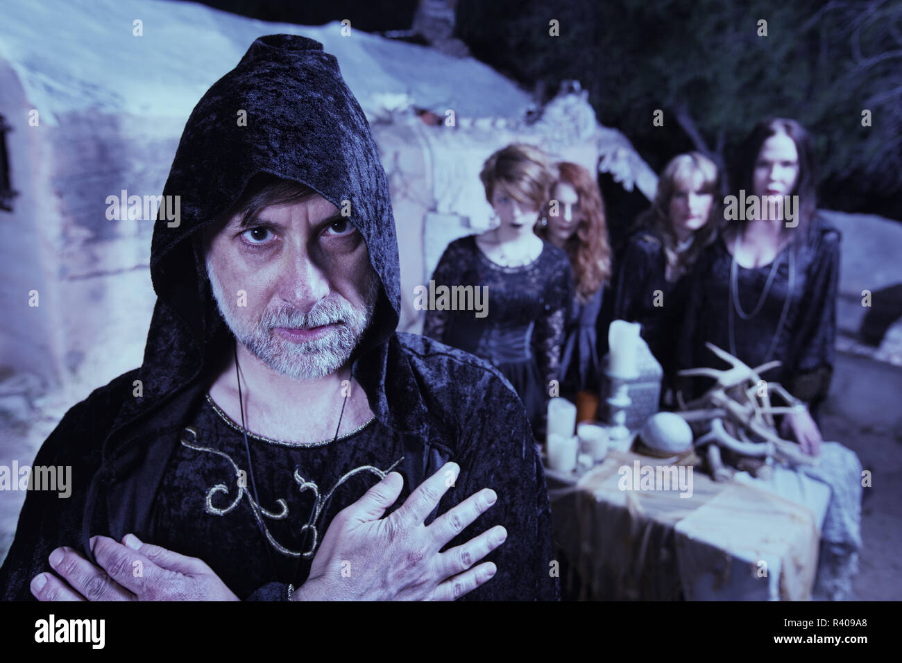 Occult Man with Women Stock Photo - Alamy