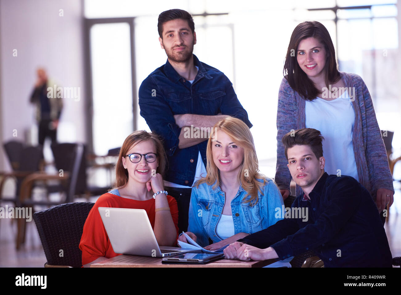 students group standing together as team Stock Photo - Alamy