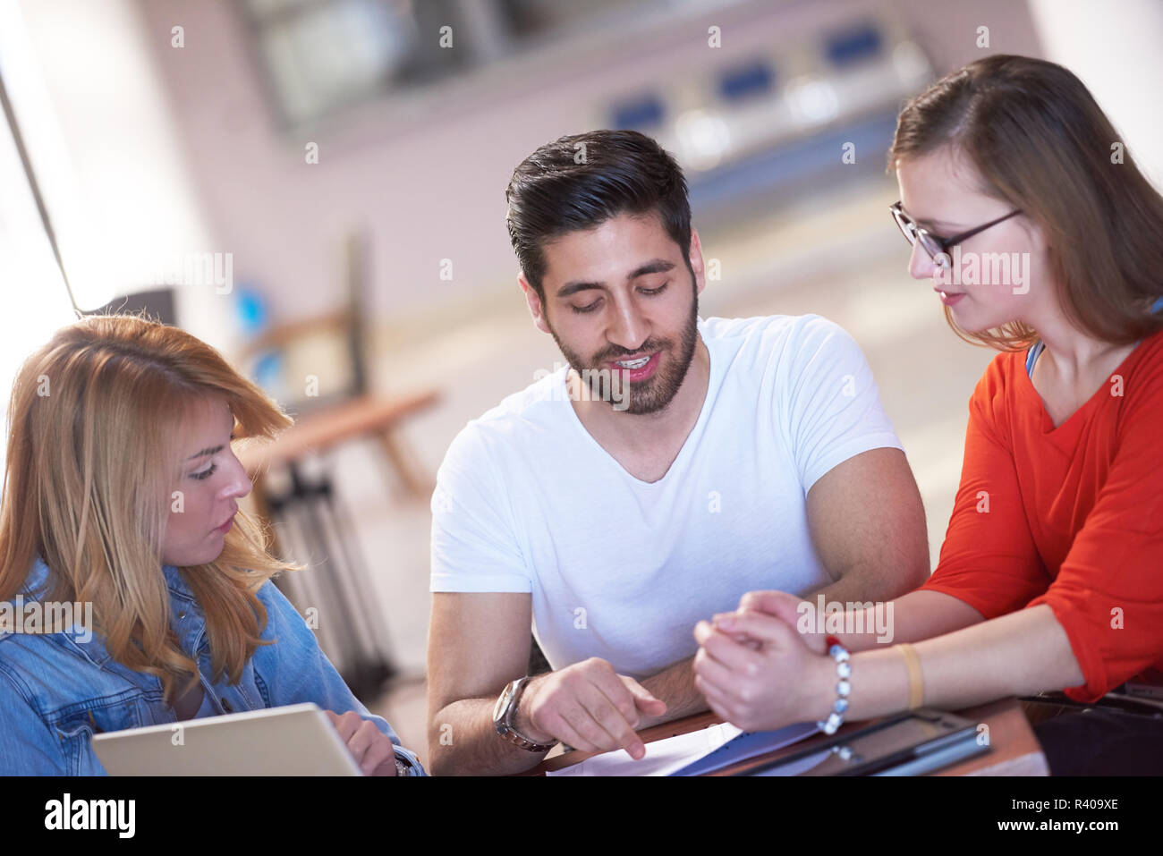 students group working on school project together Stock Photo - Alamy