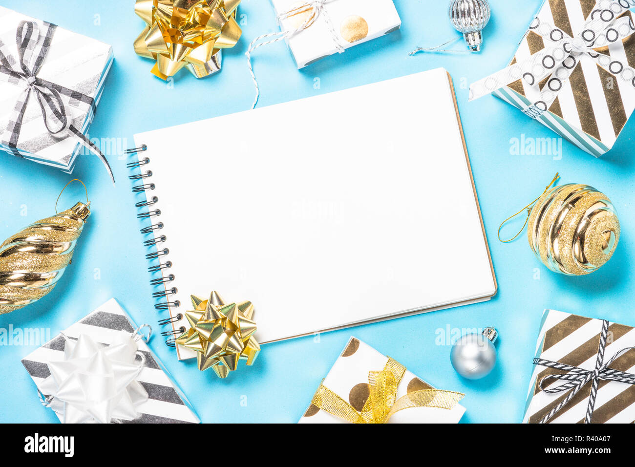 Christmas flatlay background - silver and gold decorations on bl Stock ...