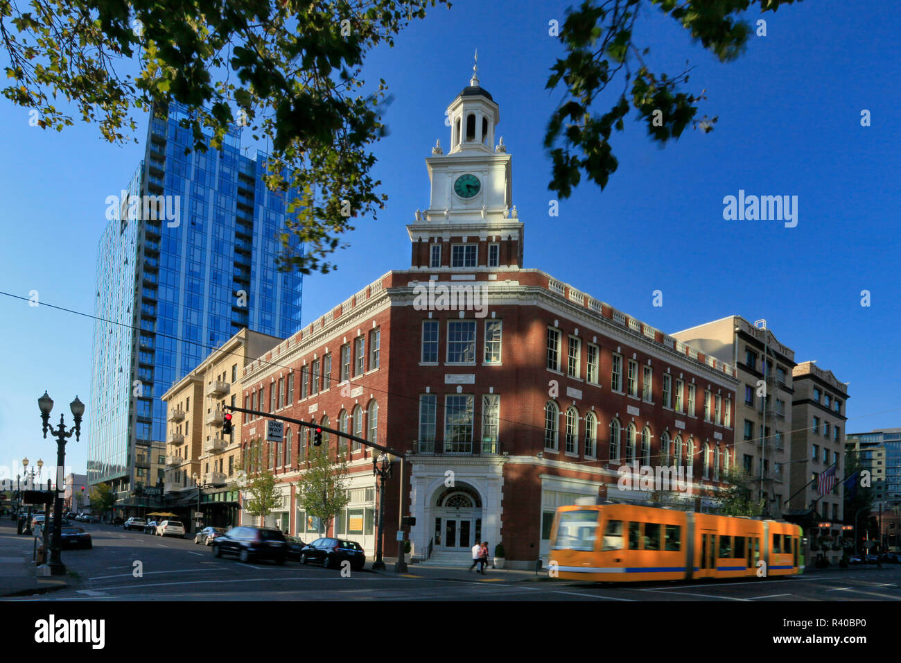 USA, Oregon, Portland. Portland Telegram building and orange Max light ...