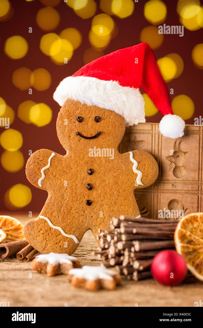 gingerbread man with santa claus hat Stock Photo - Alamy