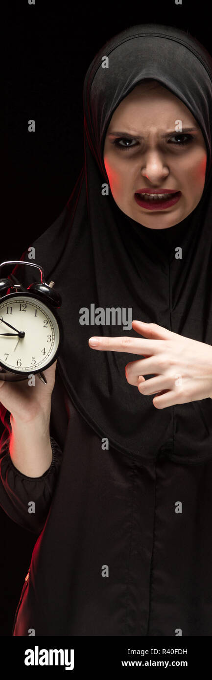 Portrait of beautiful serious scared frightened young muslim woman ...