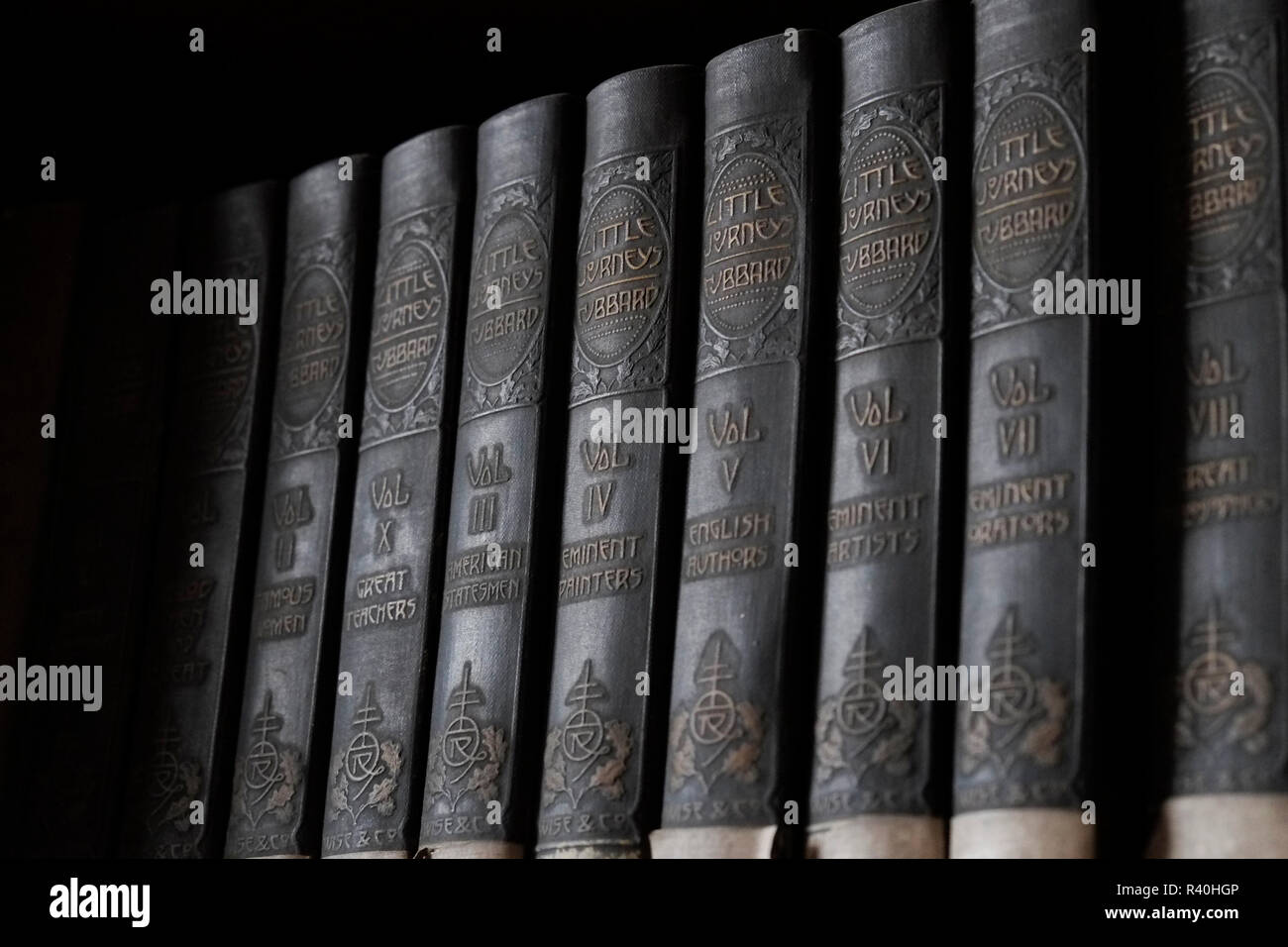 Antique black books in a library, New York, NY, USA Stock Photo - Alamy
