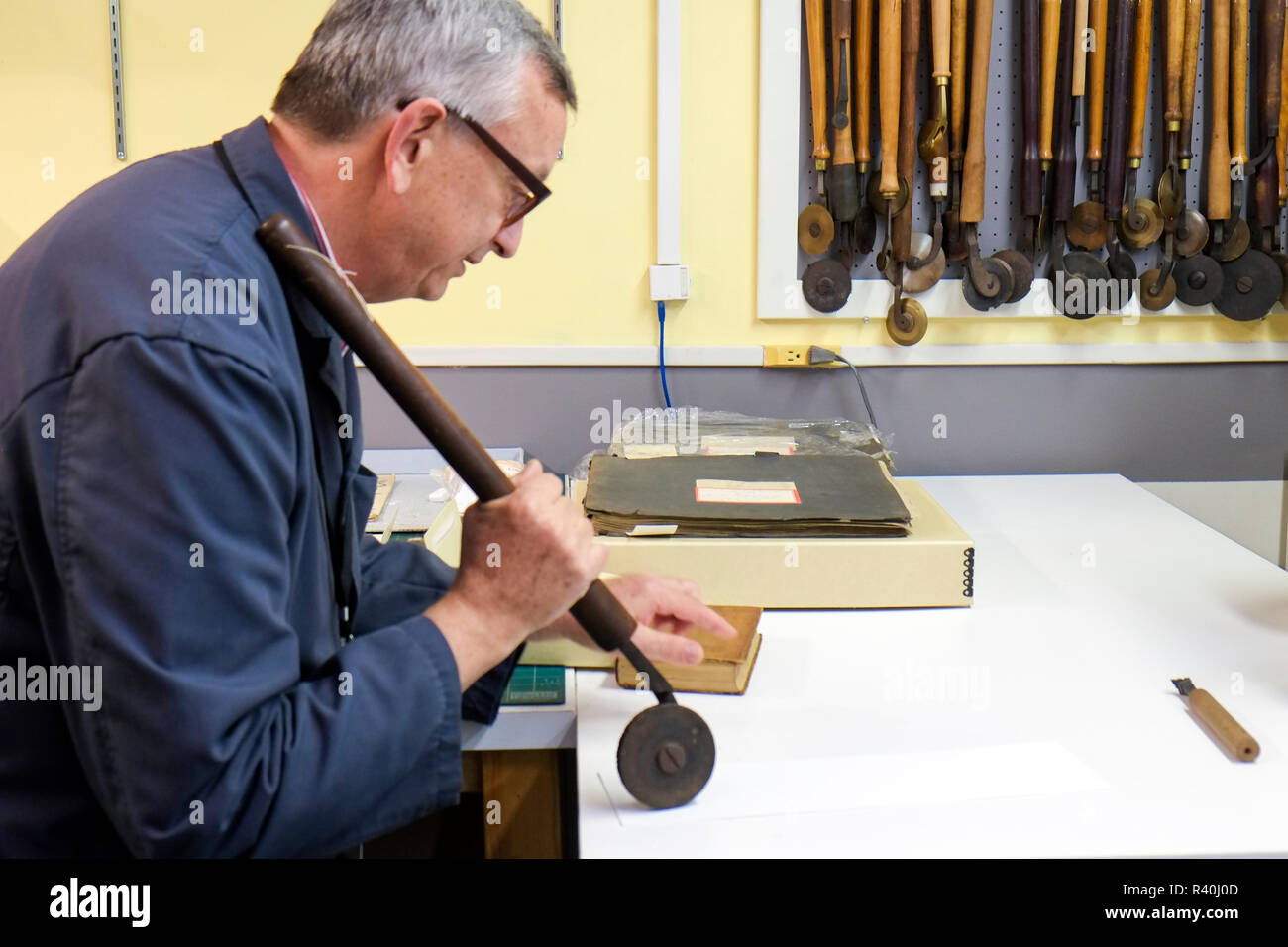 Conservationist at work at the New York Historical Society, New York ...