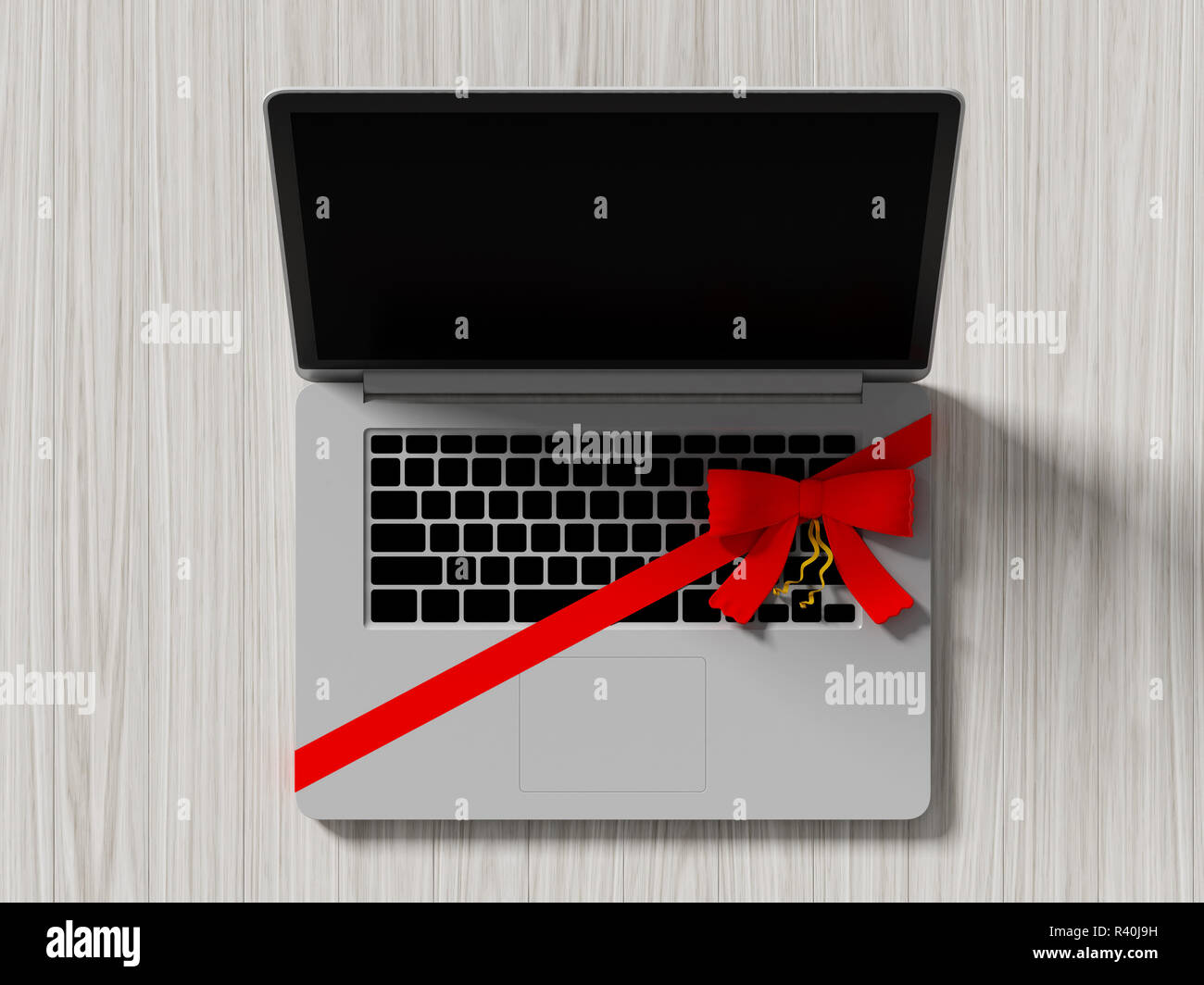 laptop wrapped with color ribbon Stock Photo - Alamy