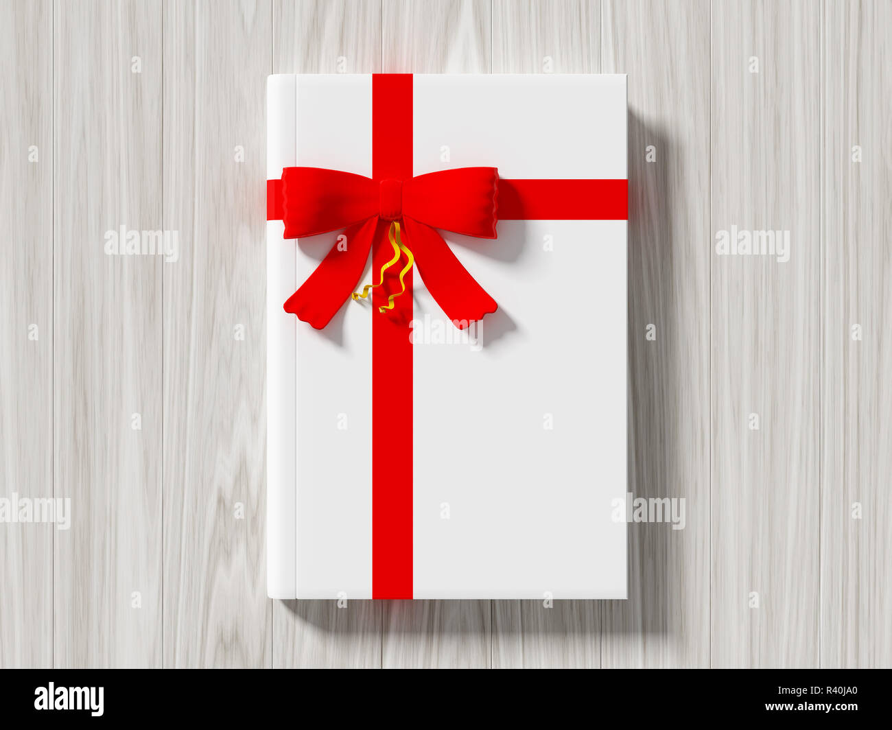 Book wrapped with color ribbon Stock Photo - Alamy