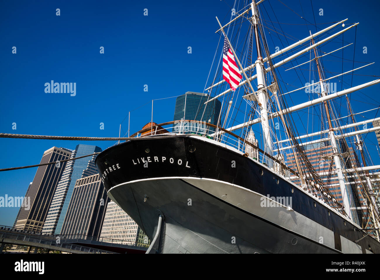 USA, New York City, Lower Manhattan, skyline with Wavertree sailing ...
