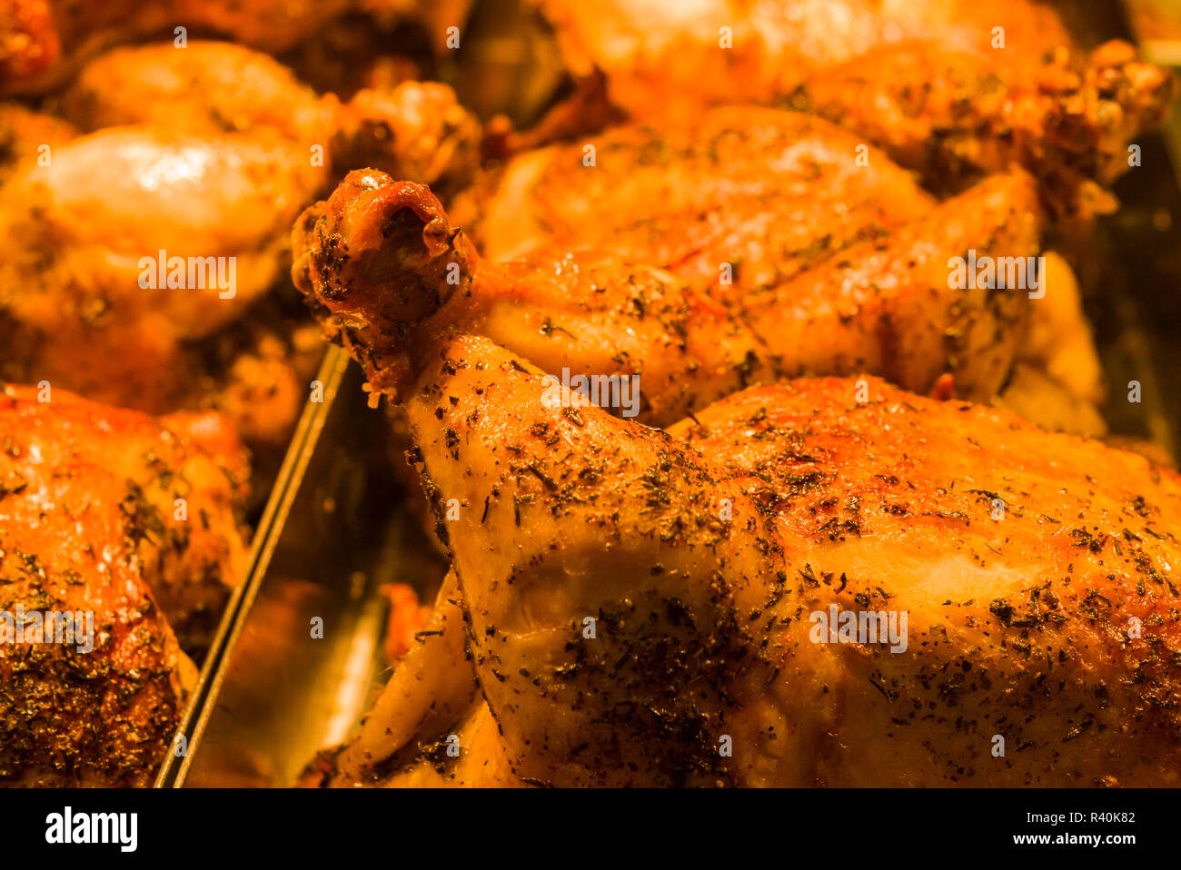 USA, New York City, Lower Manhattan, Chelsea Market, roast chicken ...