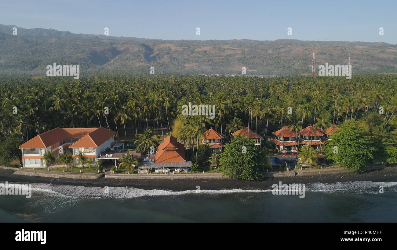 aerial seascape luxury hotel on beach background mountainss in tropical ...