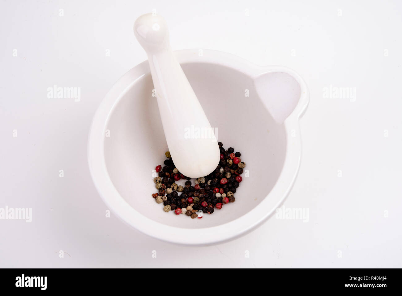 colorful pepper in a masher Stock Photo - Alamy