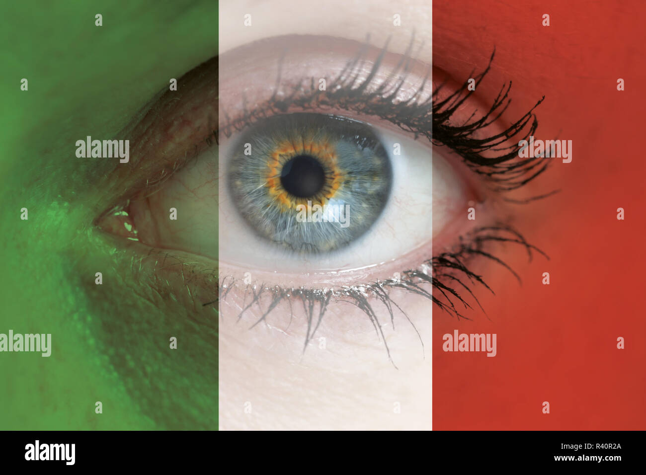 eye looks through italy flag concept background macro Stock Photo - Alamy