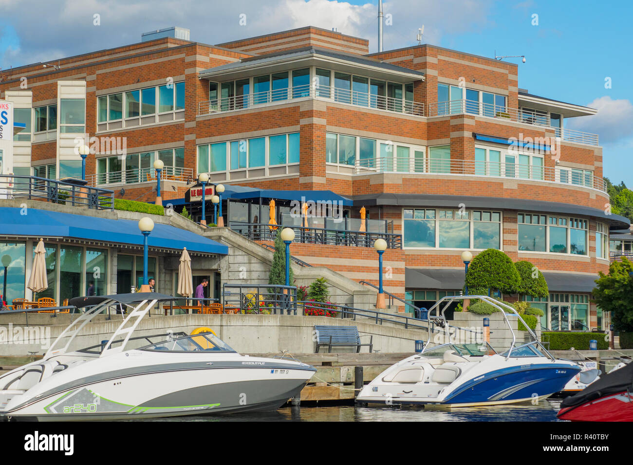 USA, Washington State, Kirkland. Boats and office buildings at Carillon ...