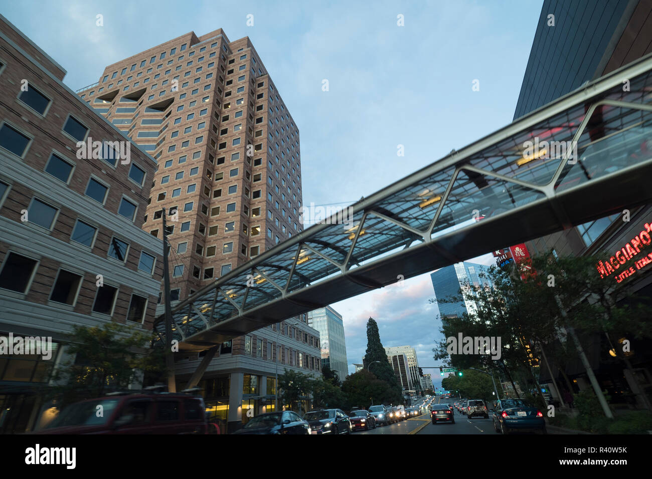 USA, Washington State, Bellevue. Pedestrian bridge over downtown street ...
