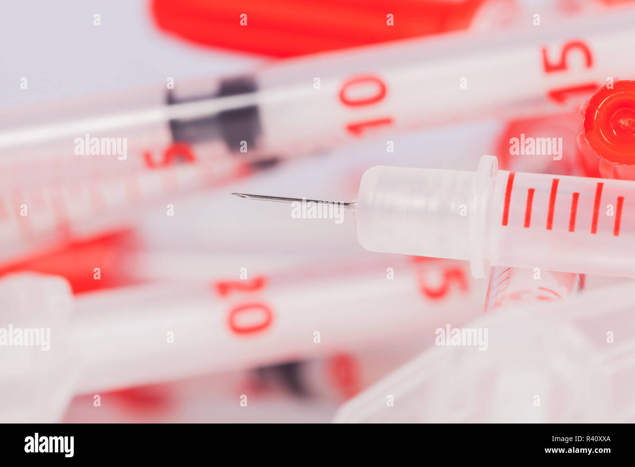 small syringes with hypodermic needles and caps drug diabetes Stock ...