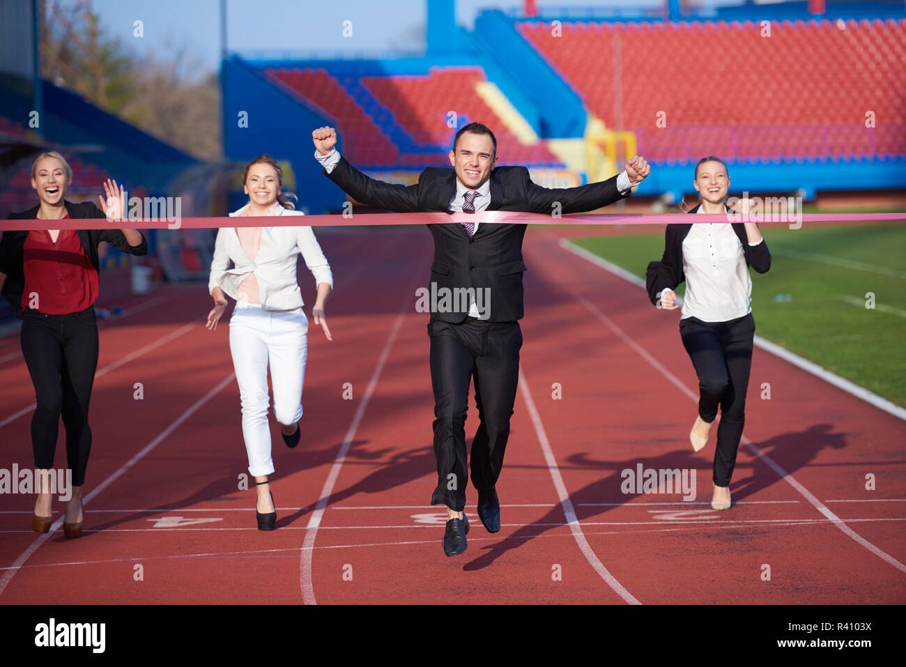 business people running on racing track Stock Photo - Alamy