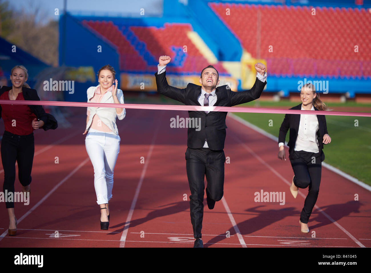 business people running on racing track Stock Photo - Alamy