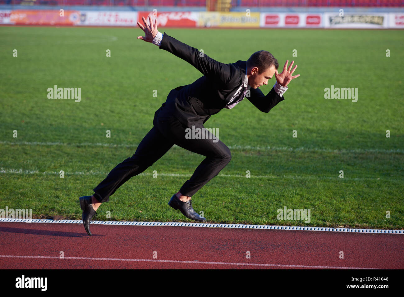 business man ready to sprint Stock Photo - Alamy