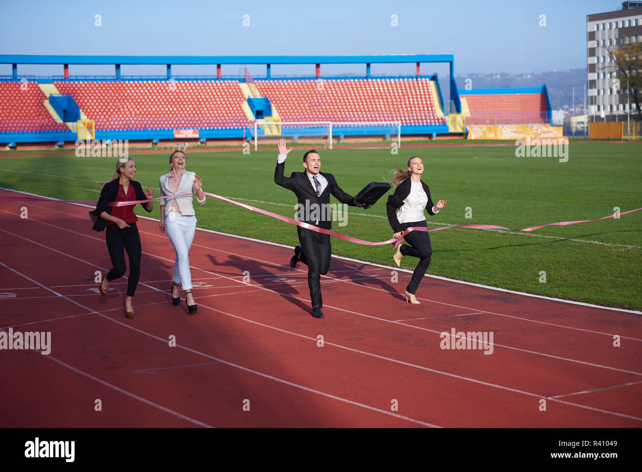 business people running on racing track Stock Photo - Alamy