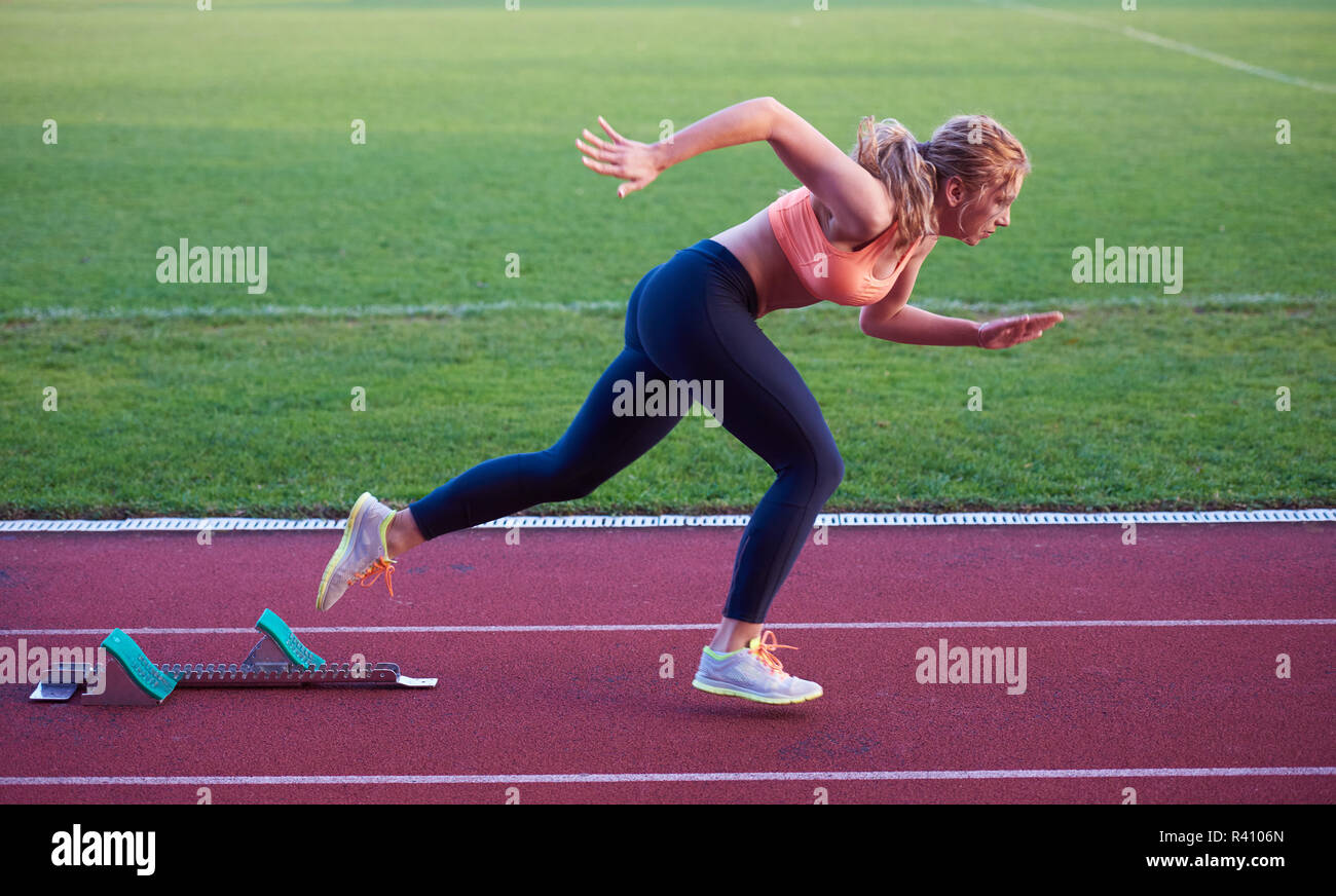 pixelated design of woman sprinter leaving starting blocks Stock Photo ...