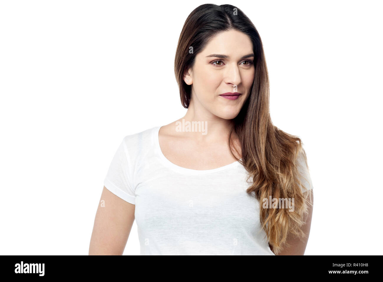 Pretty woman observing something Stock Photo - Alamy