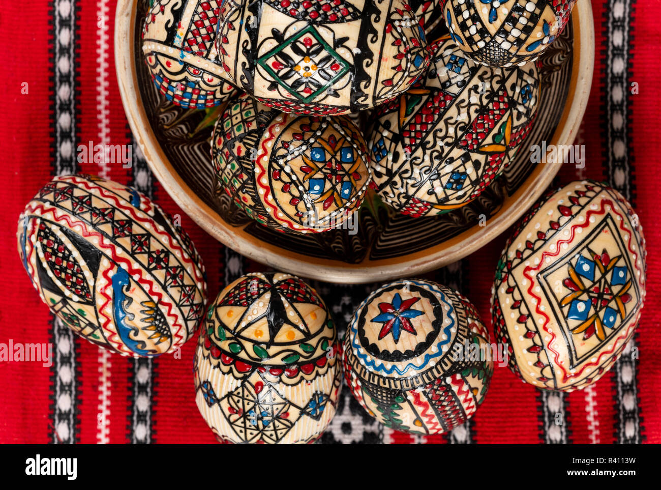 Set of wooden Easter eggs painted in traditional Eastern European style ...