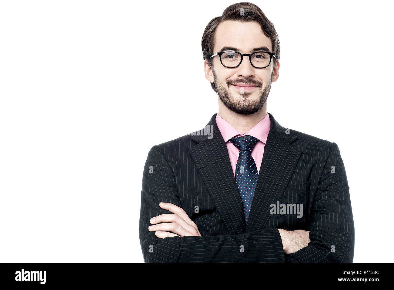 Confident businessman with a clever smile Stock Photo - Alamy