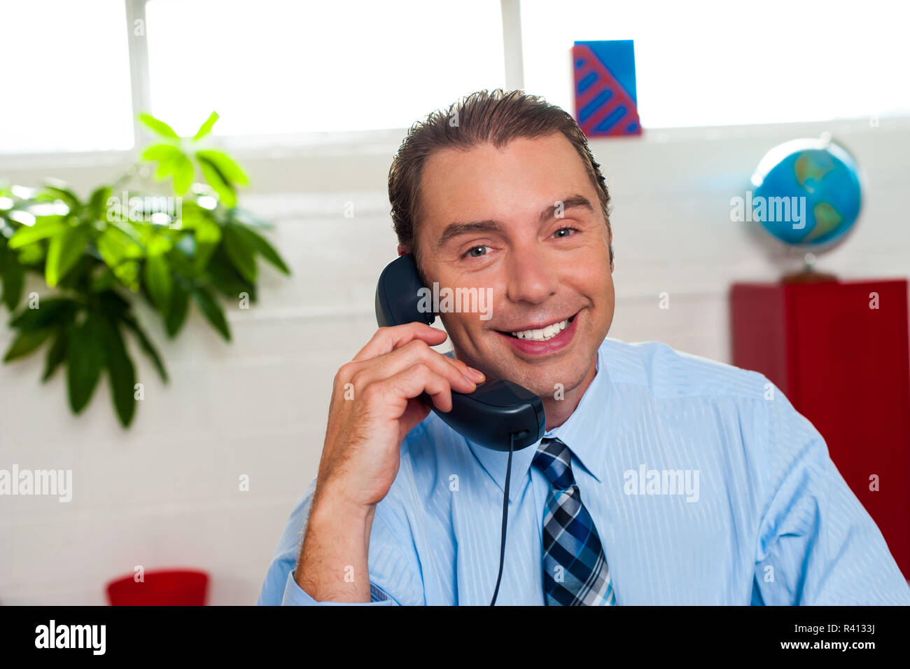 Work laughing attending hi-res stock photography and images - Alamy