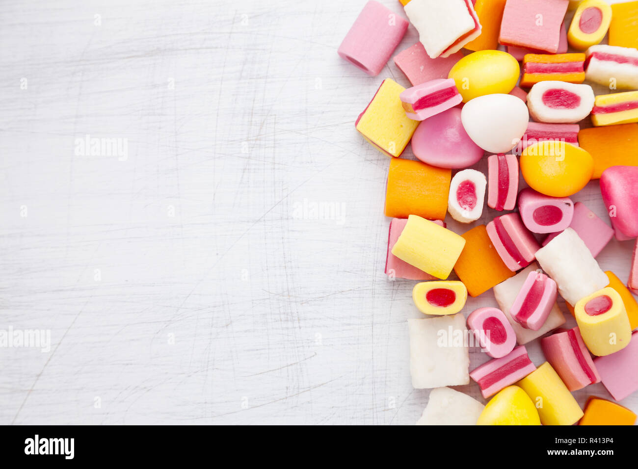 Delicious sweet candy with copy space Stock Photo - Alamy