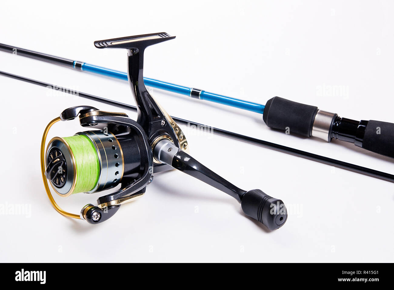 Fishing rod isolated on white Stock Photo - Alamy