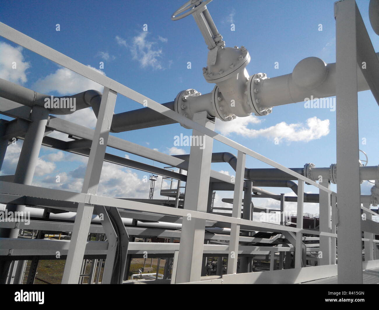 Latch on the pipeline Stock Photo - Alamy