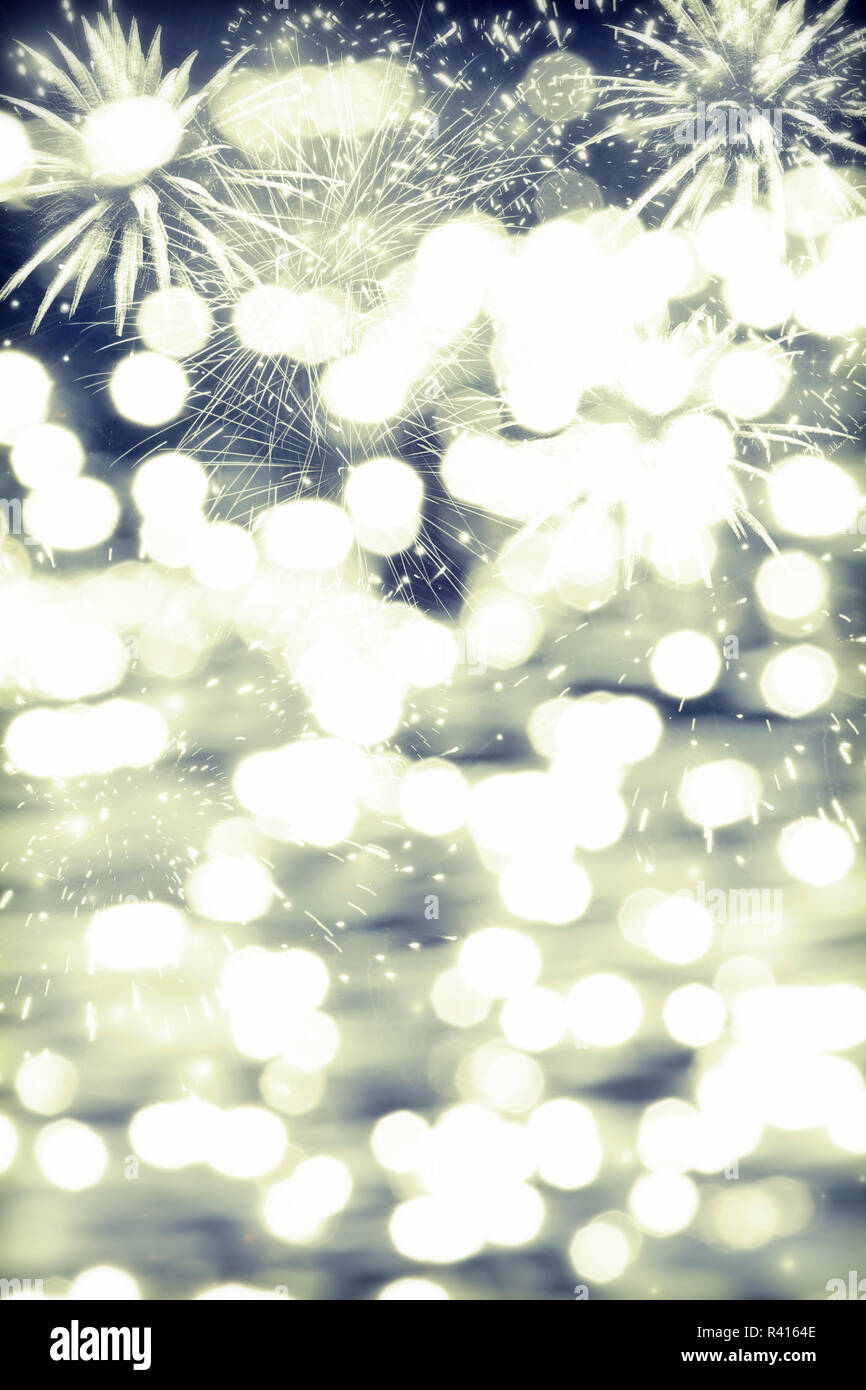 Abstract holiday background with fireworks and sparkling lights Stock ...