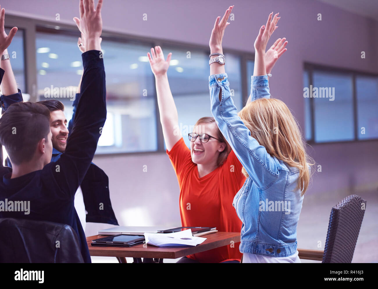 happy students celebrate Stock Photo - Alamy
