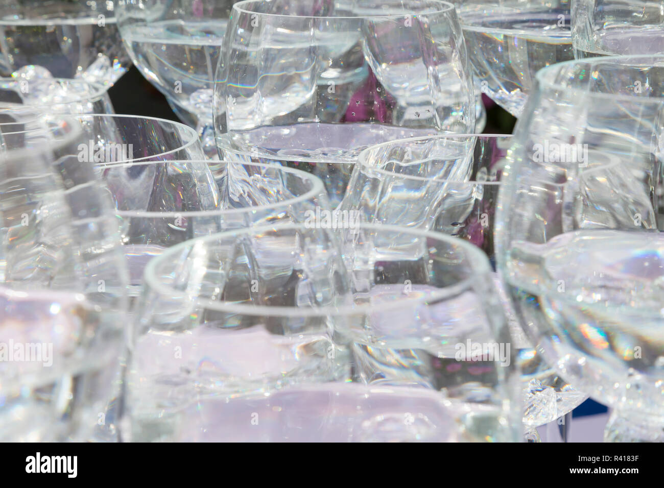 Many wine glasses stacked up and ready for use at a wedding Stock Photo ...
